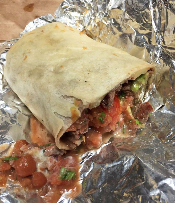 Behold the burrito in its natural habitat&mdash;halfway between fully wrapped and devoured. The filling-to-tortilla ratio is mathematical perfection.