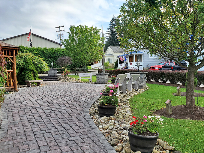 The town's charming heritage park offers a peaceful respite with its stone pathway, thoughtful landscaping, and quintessential small-town Americana atmosphere.