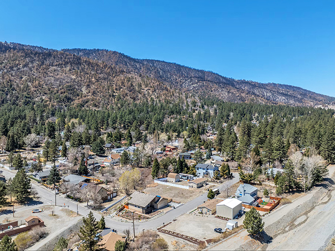 Houses scattered like monopoly pieces across the hillside &ndash; proof that real estate Tetris is alive and well in mountain communities.