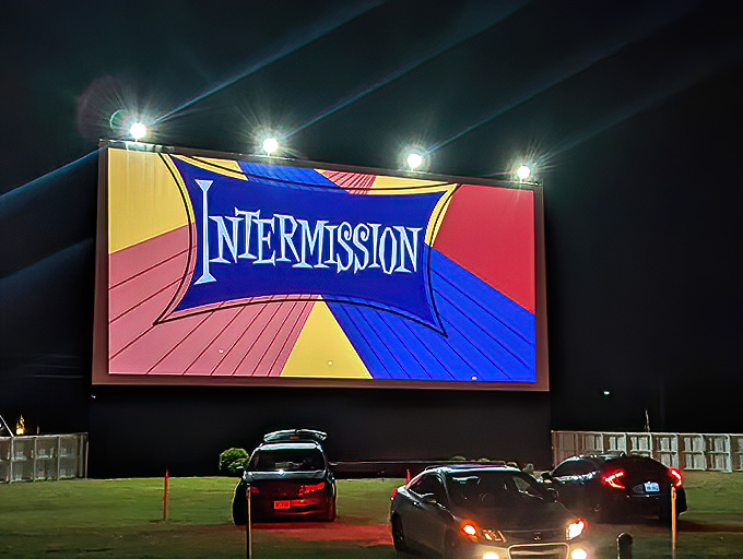 That towering screen rises like a monument to movie magic, ready to transport audiences to distant worlds.