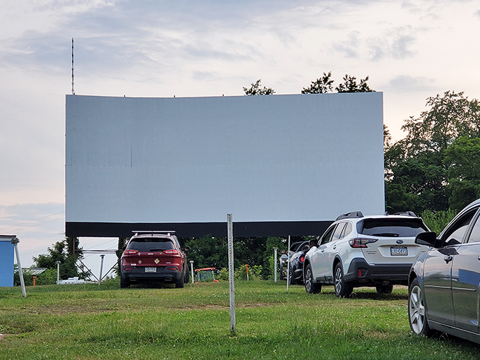 That massive white screen against the evening sky&mdash;like a blank canvas waiting for Hollywood to paint its stories for an audience under the stars.