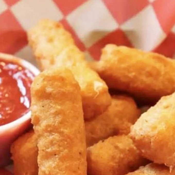 Golden mozzarella sticks that stretch like taffy and taste like pure comfort food heaven arrived.