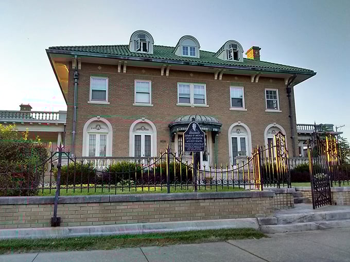 Mugivan Manor's elegant brick facade and wrought iron fence whisper tales of Peru's more prosperous days when circus magnates built architectural showpieces.