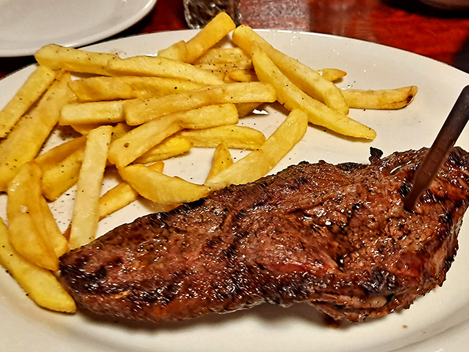 The NY Strip arrives with green beans that actually taste like vegetables should&mdash;a supporting actor that deserves its own award.