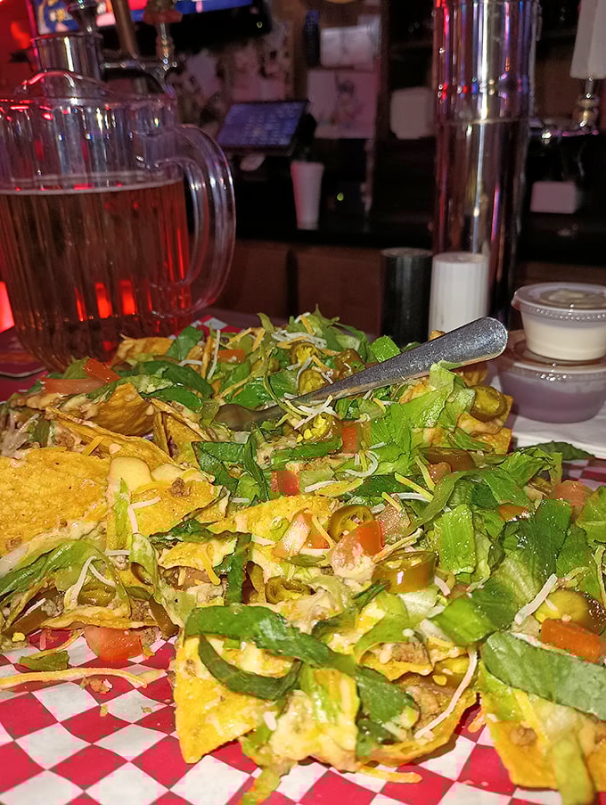 These aren't your ballpark nachos. Loaded with fresh toppings and served with a pitcher nearby—the tavern understands proper nacho-to-beverage ratios matter.