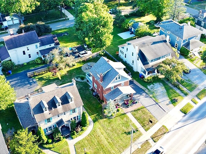 Perfectly manicured lawns and classic architecture &ndash; suburban living with a dash of Norman Rockwell thrown in for good measure.