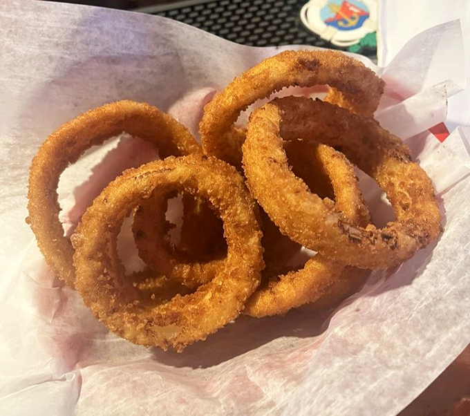 Golden halos of onion perfection. Crispy, sweet, and substantial enough to make you forget they were once vegetables.