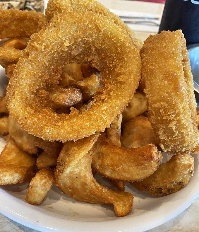 Onion rings with the kind of satisfying crunch that makes neighboring tables turn and ask, "I'll have what they're having."