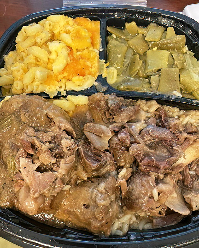 Oxtail dinner with mac and cheese and greens &ndash; the holy trinity of soul food that makes you want to hug the chef.