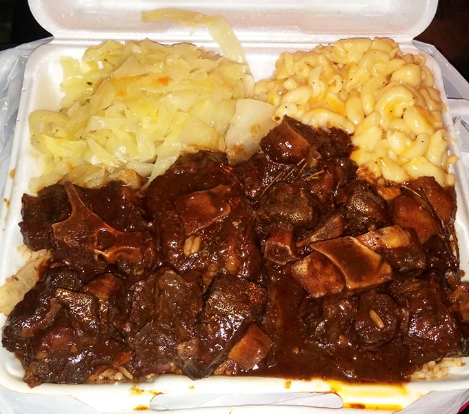 Oxtail so tender it practically surrenders at the sight of your fork, swimming in a gravy that deserves its own fan club.