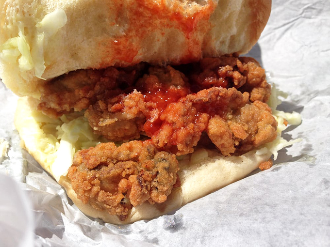 El's oyster burger&mdash;where the Atlantic Ocean meets bread. Crispy, briny perfection that makes you wonder why you'd eat oysters any other way.