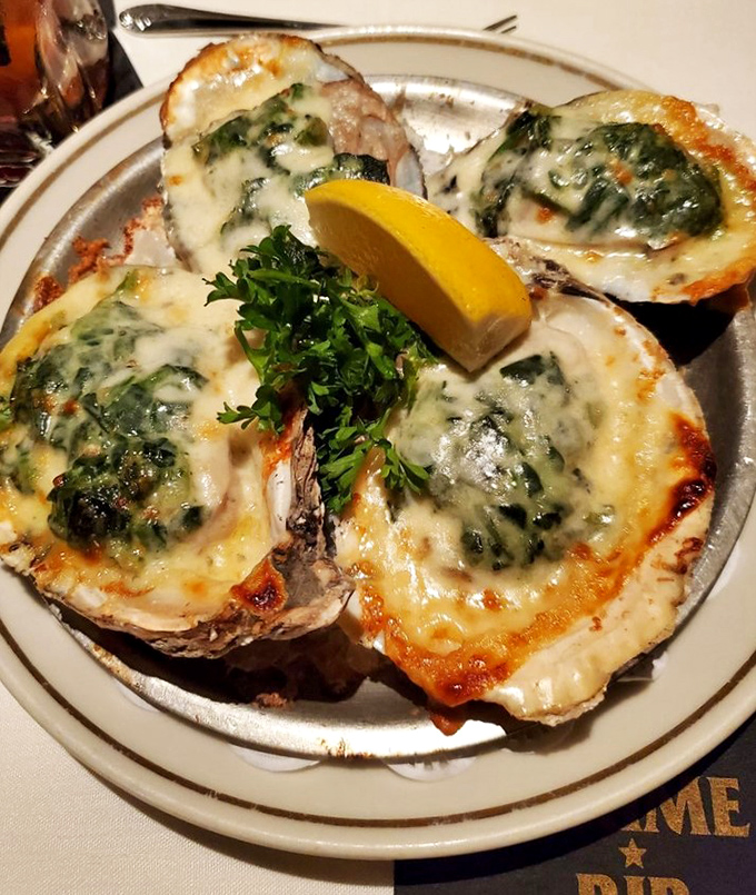 Oysters Rockefeller: where spinach earns its place at the table. These bivalves, blanketed in creamy greens and cheese, prove that vegetables can be decadent co-conspirators.
