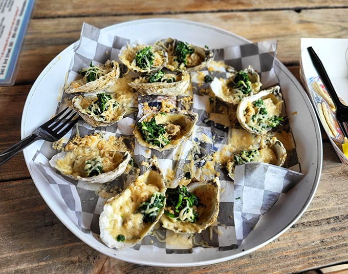 Oysters Rockefeller&mdash;where spinach suddenly becomes everyone's favorite vegetable when paired with briny shells and melted cheese.