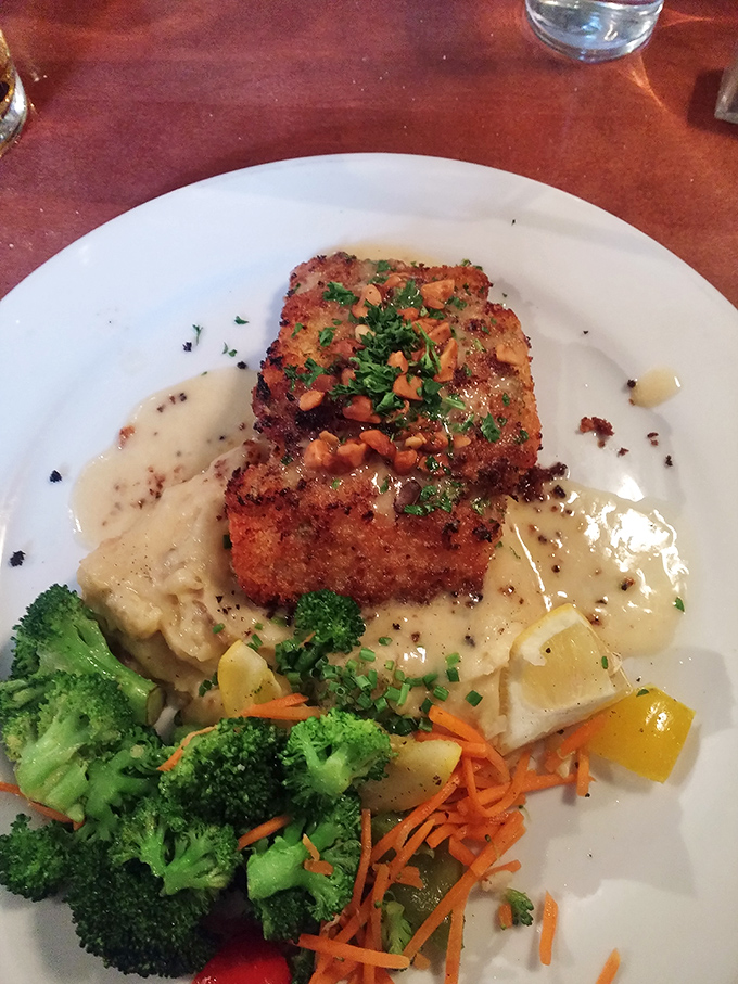 This pan-seared Mahi Mahi perched atop creamy mashed potatoes isn't just dinner—it's edible architecture with a delicious story to tell.