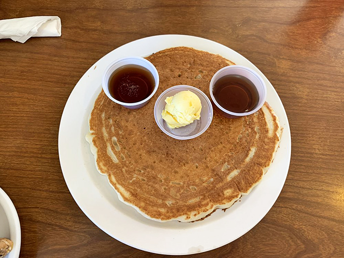 The pancake that ate Williams! This golden disc of perfection comes with its own butter island and syrup rivers.