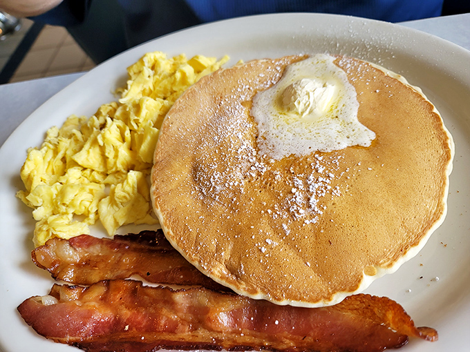 Pancakes so perfectly golden they deserve their own sunrise. Add real butter and syrup, and Monday mornings suddenly feel manageable.