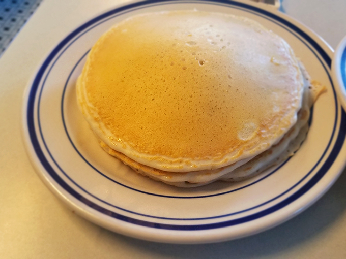 Golden pancakes that look like they're auditioning for a breakfast commercial&mdash;fluffy, perfectly round, and ready for their syrup shower.