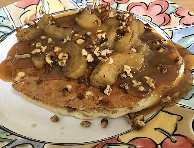 Fluffy pancakes wearing butter crowns, ready to soak up syrup like breakfast royalty deserves proper treatment.