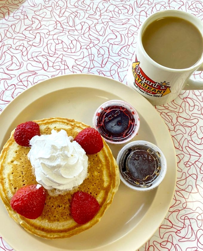 Fluffy pancakes crowned with berries - because breakfast should always feel like a celebration.
