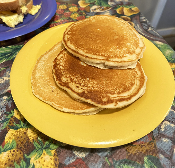Pancakes so perfectly golden they belong in Fort Knox. Simple perfection that needs nothing more than a drizzle of syrup.