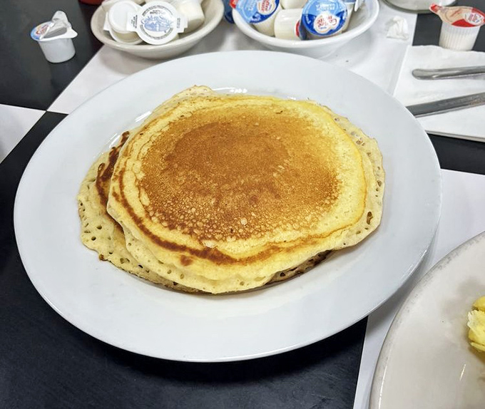 This pancake isn't just big&mdash;it's the size of your childhood dreams. Golden, fluffy, and ready for its maple syrup waterfall.