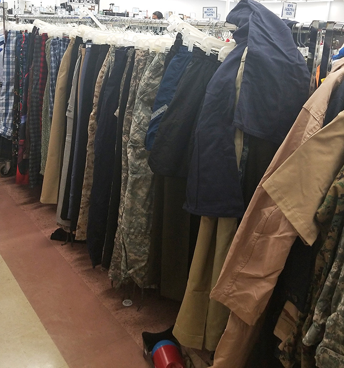 Military precision meets thrift store randomness in the pants section. That perfect pair of khakis is hiding here somewhere, playing hard to get.