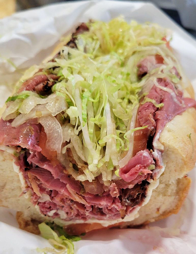 Behold the cross-section of a proper deli sandwich – where the meat isn't playing hide and seek but proudly announcing its presence.