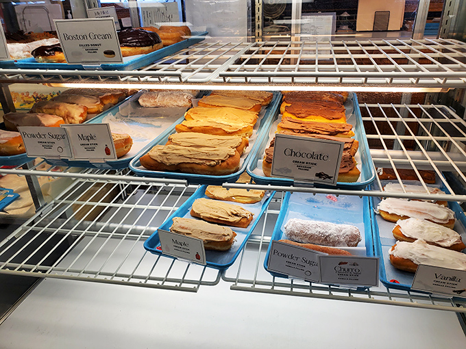 Fresh pastries lined up like soldiers of sweetness, ready to conquer your morning coffee routine.