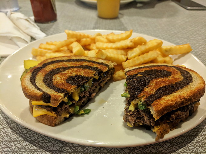Behold the legendary patty melt&mdash;where caramelized onions, melted cheese, and seasoned beef unite on grilled rye in what can only be described as sandwich nirvana.