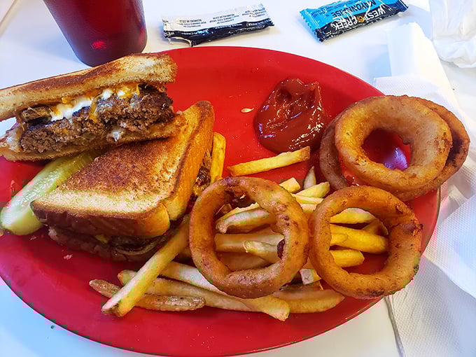 The patty melt: where burger meets grilled cheese in a beautiful union that would make even the most jaded food critic weep with joy.