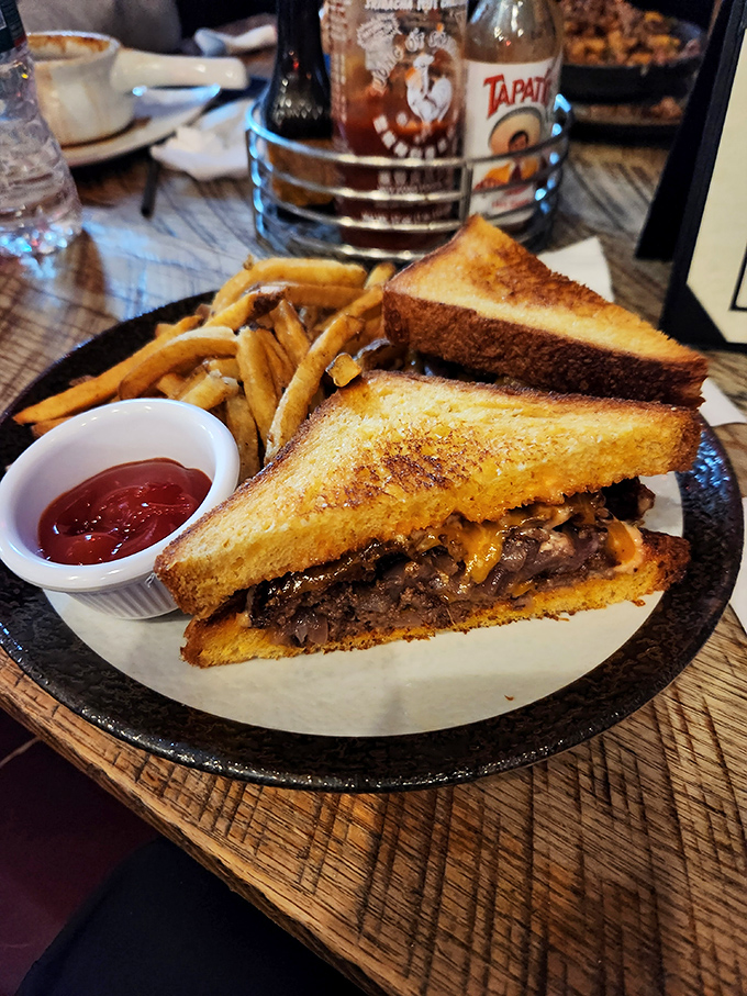 Comfort food elevated to an art form. This patty melt combines a perfectly seasoned burger with golden toast and melty cheese&mdash;the holy trinity of sandwich perfection.
