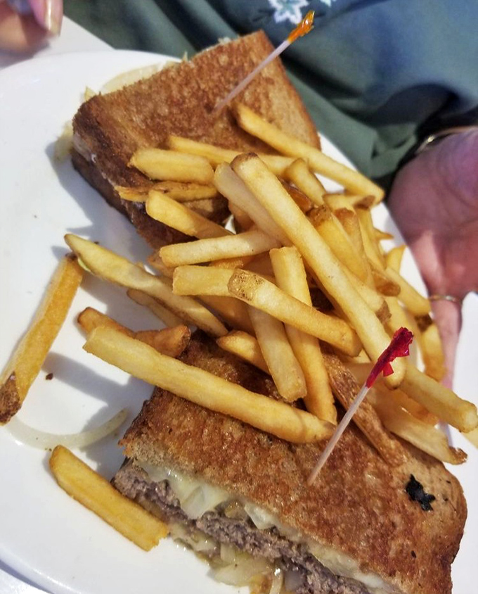 The patty melt&mdash;that perfect marriage of burger and grilled cheese. Those golden-brown edges are where dreams and extra napkins happen.