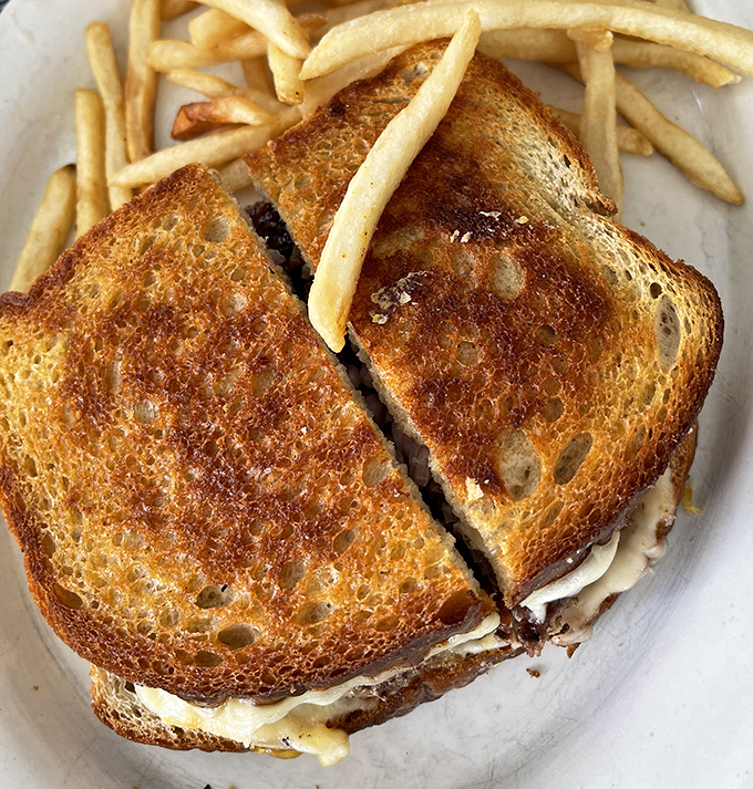 A proper diner patty melt should look exactly like this&mdash;golden bread, melty cheese, and a burger that knows its purpose in life is to make you happy.