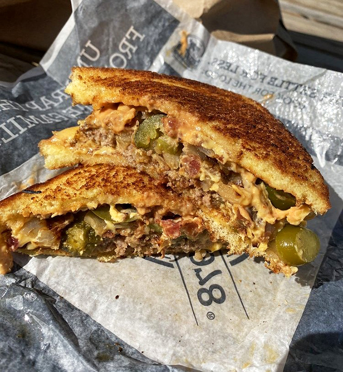 Not your grandmother's patty melt (though she'd approve). Golden-brown bread, melty cheese, and that cross-section view revealing all the savory goodness inside.