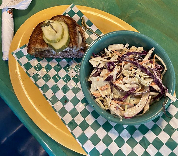 The patty melt&mdash;that glorious hybrid of burger and grilled cheese&mdash;meets its perfect companion in a side of fresh, crunchy coleslaw. Comfort food, elevated.