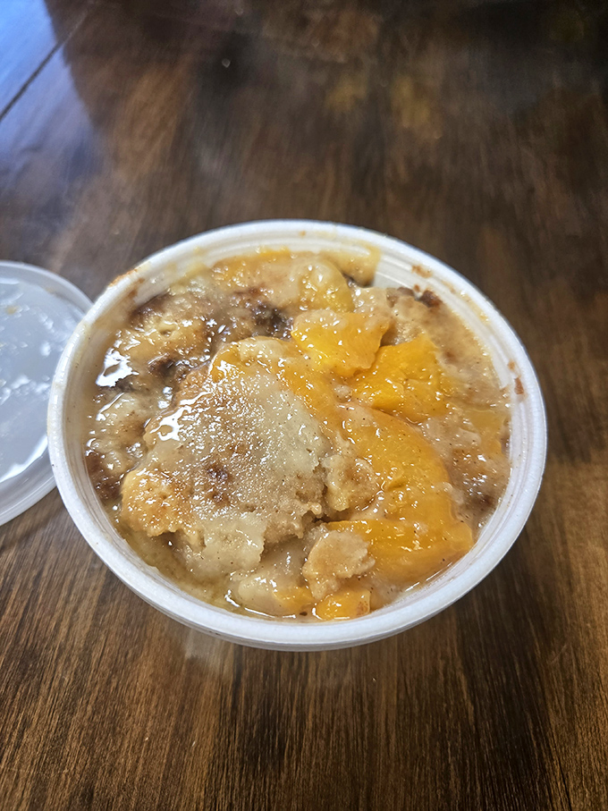 Peach cobbler that captures summer in a cup. The fruit and buttery crust perform a delicious duet that makes you close your eyes with each bite.