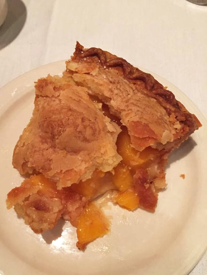 This peach pie isn't just dessert; it's summer sunshine captured in a perfect crust, with fruit that surrenders just enough juice to make you reach for a napkin.