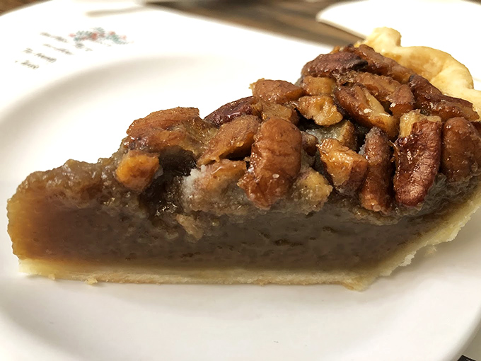 Pecan pie so rich it should have its own tax bracket. The perfect marriage of gooey filling and crunchy nuts.