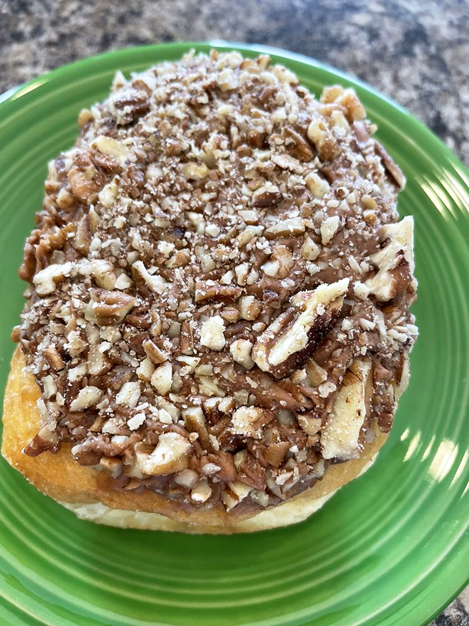 Pecans and maple glaze transform a simple donut into something your cardiologist would disapprove of but your soul desperately needs.