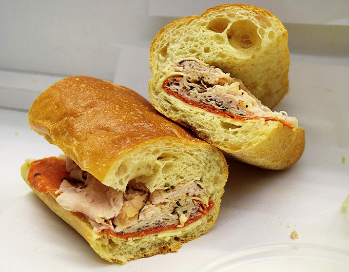 The turkey hoagie reveals its secrets: a perfect ratio of meat to cheese to veggies, all nestled in that quintessential Philadelphia roll.