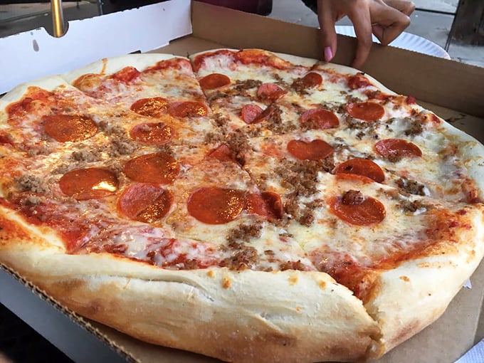 This pepperoni and sausage pizza doesn't need a fancy wood-fired oven or imported ingredients to achieve greatness&mdash;just decades of know-how.