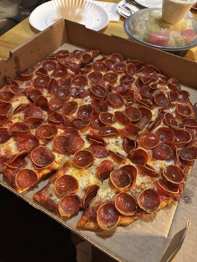 Pepperoni that curls into perfect little flavor cups, creating tiny pools of deliciousness. This isn't just pizza&mdash;it's edible art for the everyman.