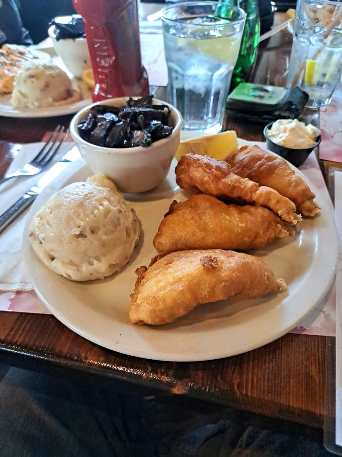 Golden-battered perch that looks like it just won first prize at the county fair of deliciousness.