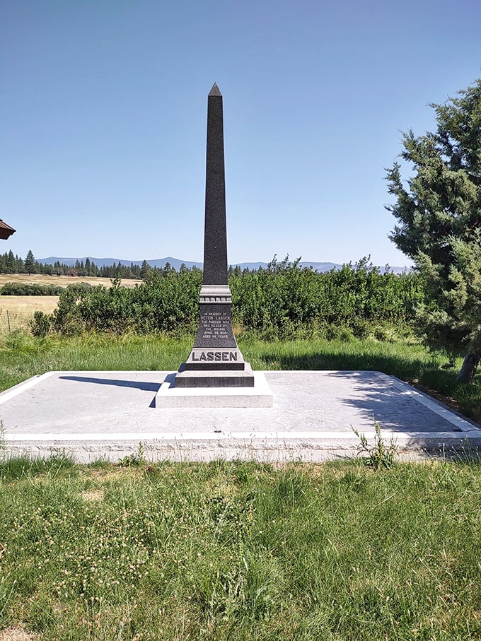 The Lassen Monument stands as a dignified reminder of the region's pioneer history, silently watching over the landscape it helped shape.