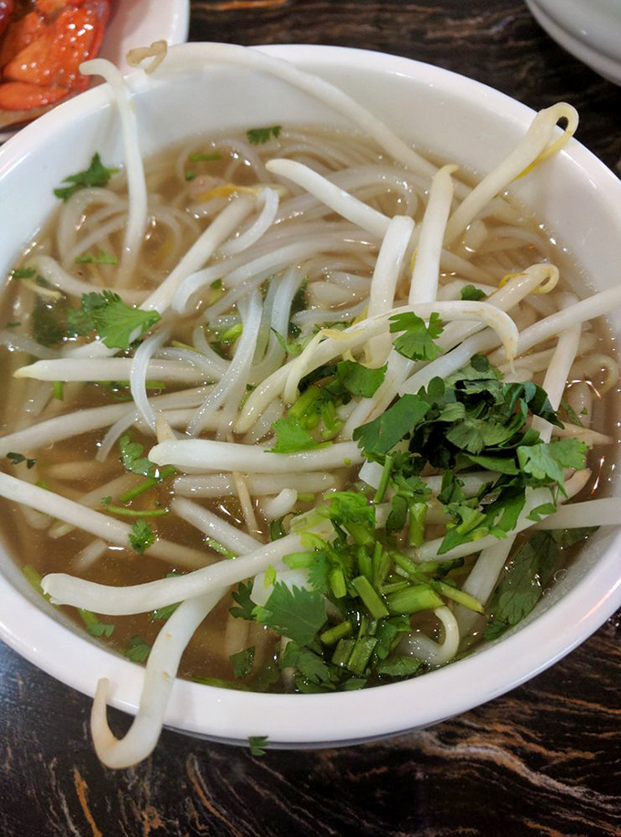 Noodle soup that demands respect &ndash; fresh herbs, delicate broth, and noodles with just the right chew. Slurping encouraged, not judged.