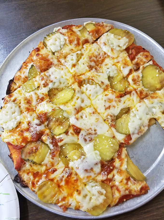 Pickle pizza might sound like a dare from your grandkids, but the tangy brine against melted cheese creates an unexpectedly harmonious flavor symphony.