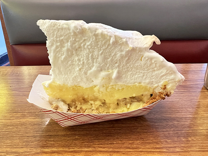 Cream pie that would make your grandmother both proud and jealous. That mile-high meringue isn't just dessert—it's an engineering marvel.