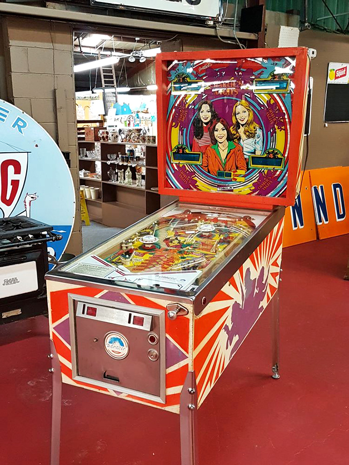 Charlie's Angels pinball machine! The ultimate 70s flashback that has me wondering if Farrah Fawcett's hair ever actually fit inside a helmet.