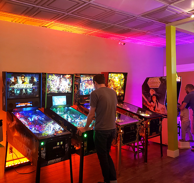 The hypnotic lights of pinball machines create their own galaxy&mdash;each flipper click a tiny rebellion against growing up.