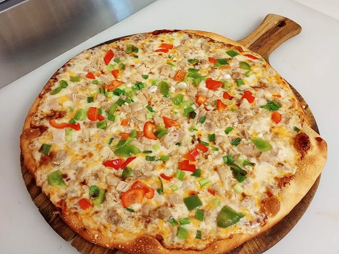 Pizza that proves you don't need a brick oven imported from Naples to create something magical. Those colorful bell peppers are practically waving hello.